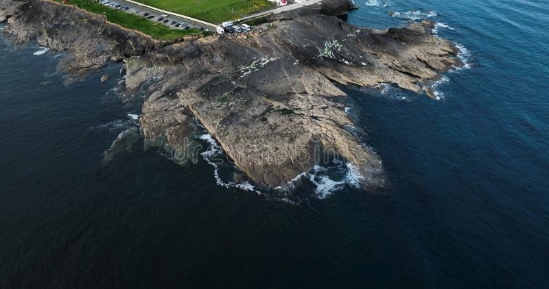 Irish Ancient Lighthouse Against a Backdrop of Cliffs 4k Stock Video ...