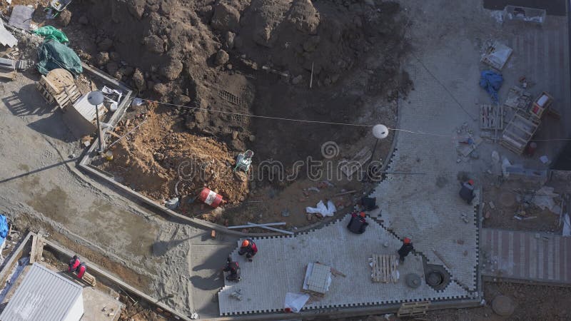 Aerial Perspective of Construction Workers at Work on the Job Site ...
