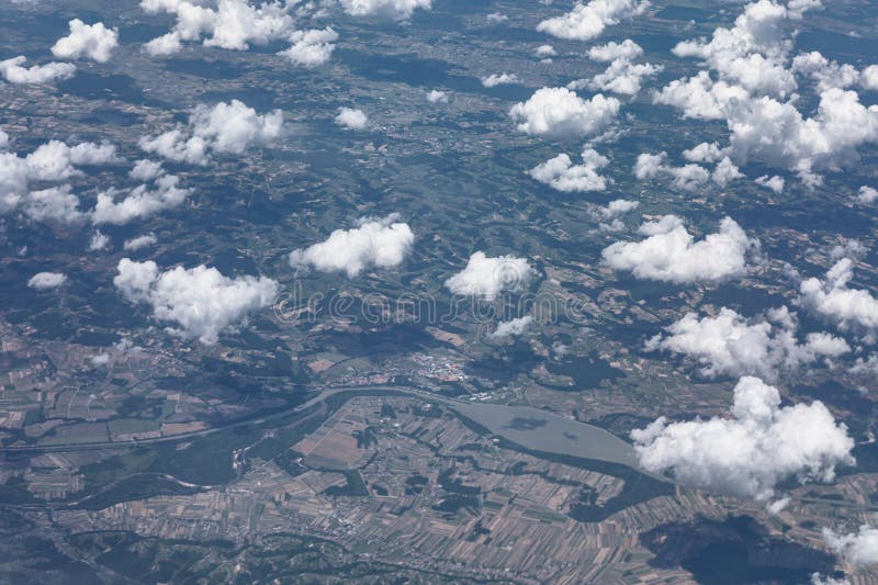 Aerial Perspective of Fluffy Clouds from an Airplane Stock Photo ...