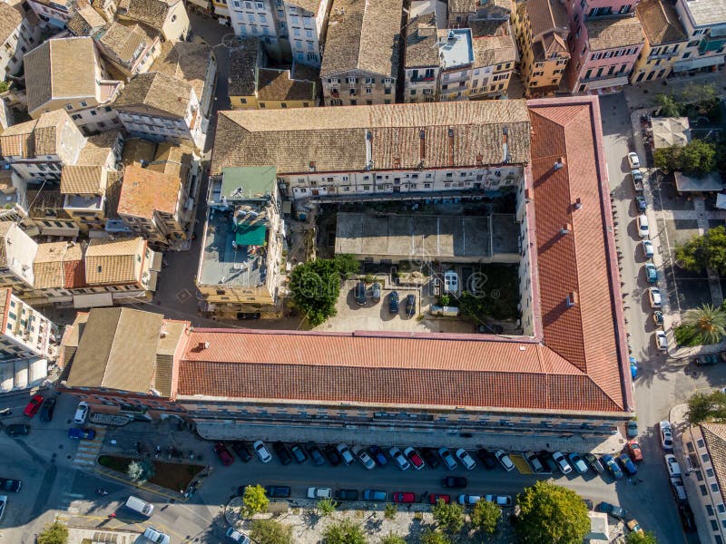 Aerial View of a Large Building Complex in a Dense City, Surrounded by ...