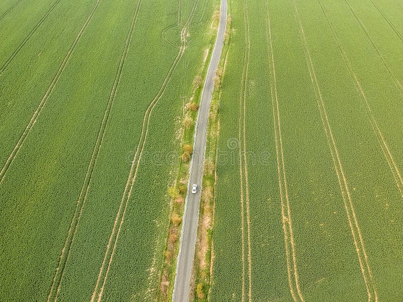 Aerial Photo of the Tar Road between the Green Fields Stock Photo ...
