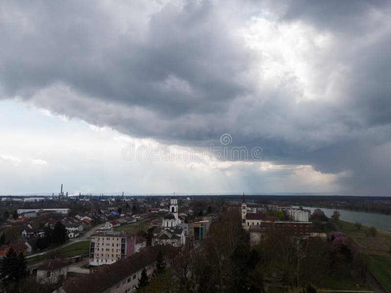 Aerial Photo with a View of the City by the River during a Cloudy Day ...
