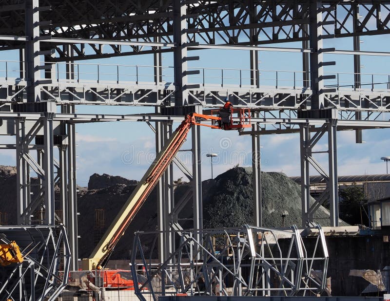 Aerial Platform at Work Inside the Metal Structure of a Large ...