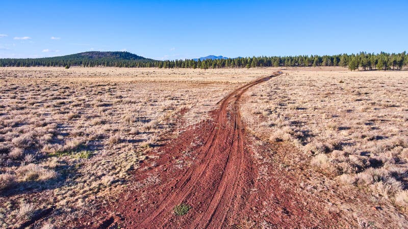 Aerial of Red Sand Desert Road in Fields of Shrubs Stock Photo - Image ...