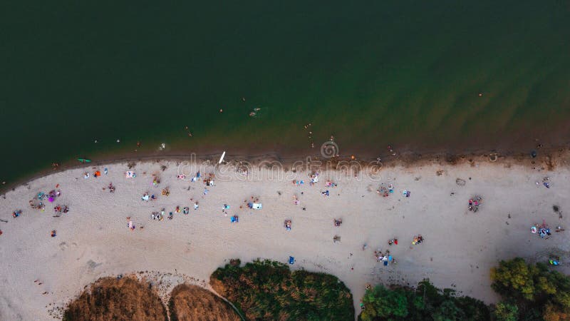 Aerial of a Scenic Beach with Many People on the Sand on Vacation Stock ...