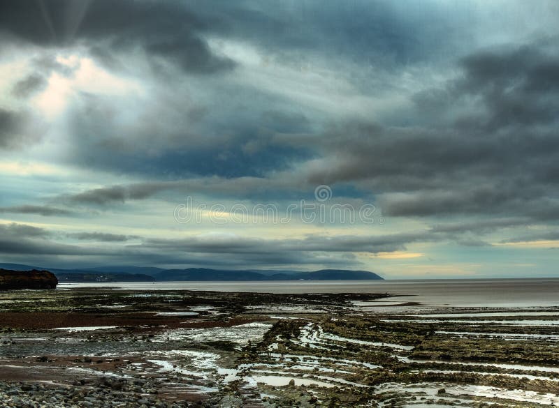 Aerial Shot of the Beautiful Kilve Beach Under a Cloudy Sky Stock Photo ...