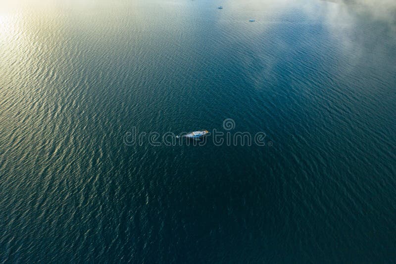 Aerial Shot of a Boat in the Endless Sea Stock Image - Image of outdoor ...
