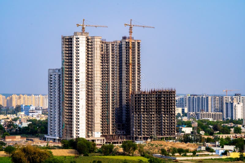 Aerial Shot of Building Under Construction with Crane at the Top Stock ...