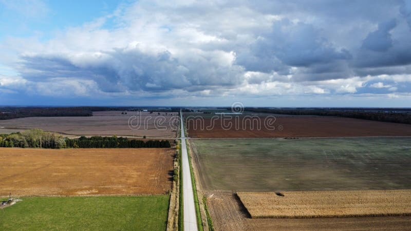 Aerial Shot of Different Types of Plant Fields on a Cloudy Day Stock ...