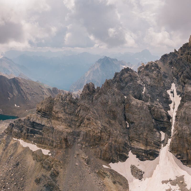 Aerial Shot of a High Mountain Top with Snow Stock Photo - Image of ...