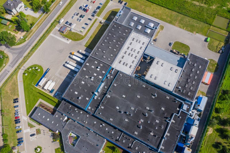 Aerial Shot of Industrial Loading Area Where Many Trucks are Unloading ...