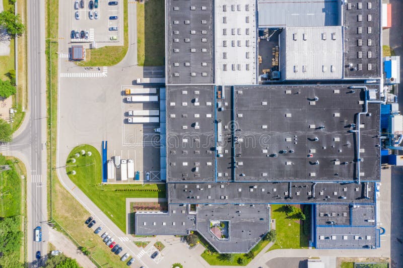 Aerial Shot of Industrial Loading Area Where Many Trucks are Unloading ...