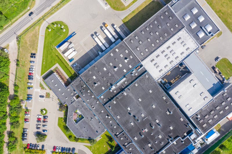 Aerial Shot of Industrial Loading Area Where Many Trucks are Unloading ...