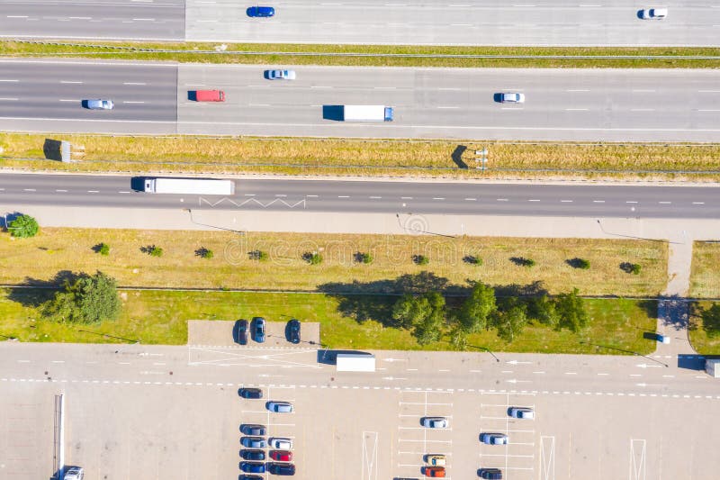 Aerial Shot of Industrial Loading Area Where Many Trucks are Unloading ...