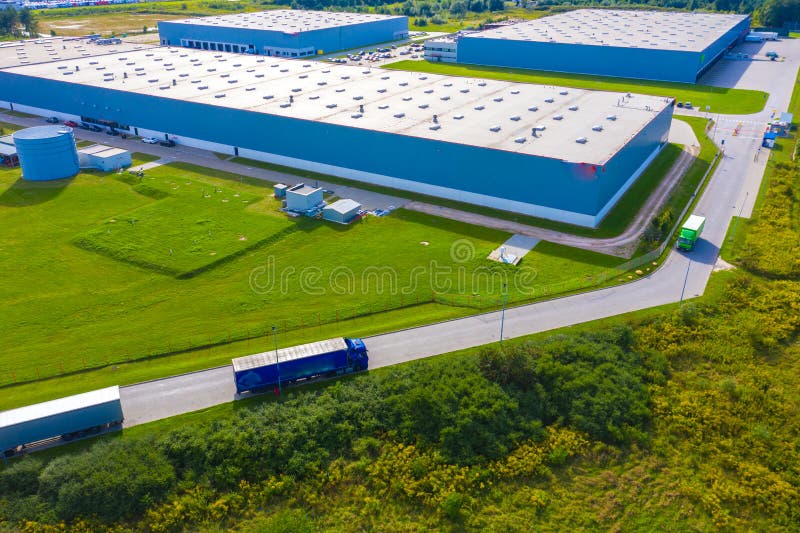Aerial Shot of Industrial Loading Area Where Many Trucks are Unloading ...