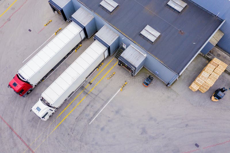 Aerial Shot of Industrial Warehouse/ Storage Building/ Loading Stock ...