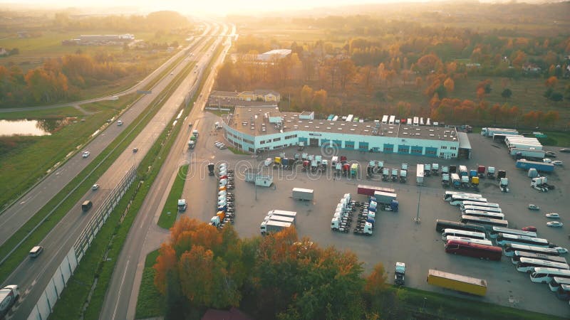 Aerial Shot on a Logistics Park with a Warehouse - a Loading Hub. Semi ...