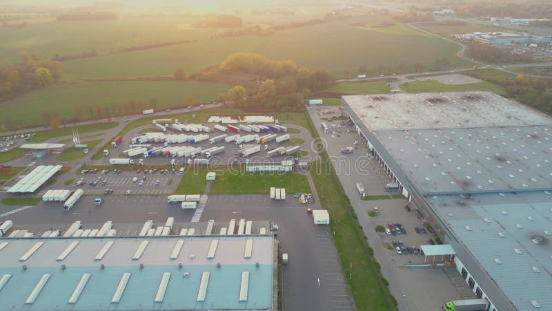 Aerial Shot on a Logistics Park with a Warehouse - a Loading Hub. Semi ...