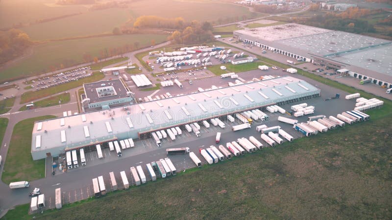 Aerial Shot on a Logistics Park with a Warehouse - a Loading Hub. Semi ...