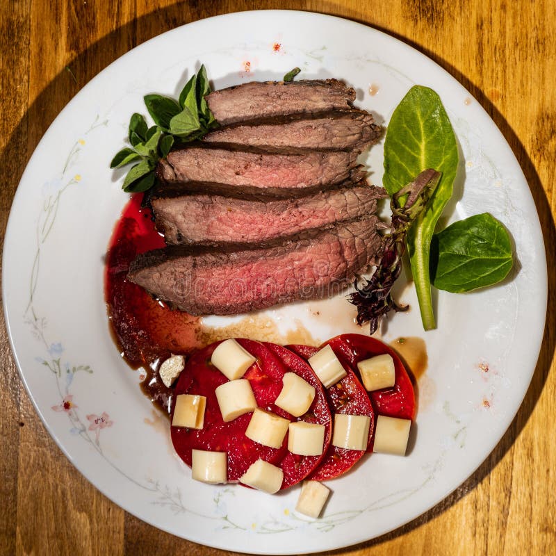 Aerial Shot of a Rare Cooked Meat Stock Photo - Image of dinner, pepper ...