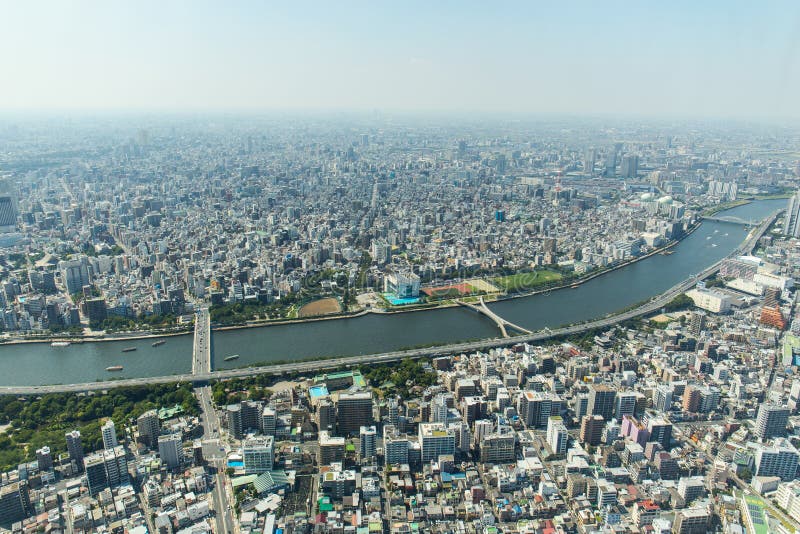 Aerial Shot of a River Running through the Middle of a City Stock Photo ...