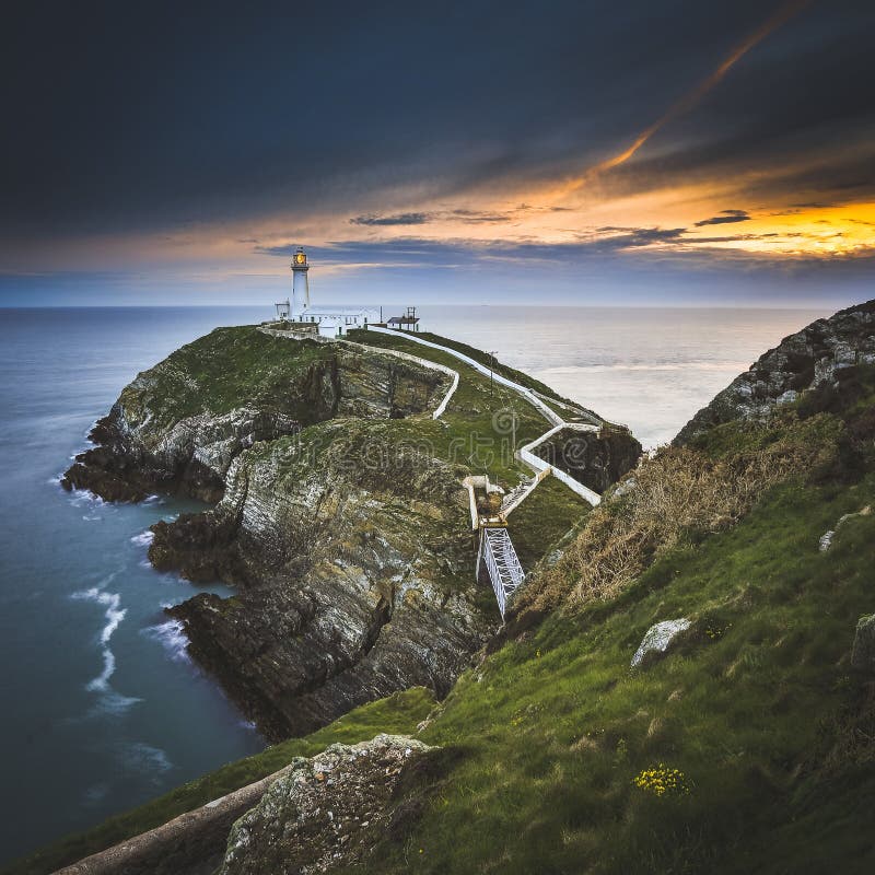 Aerial Shot of South Stack Lighthouse on a Cliff Under the Dramatic ...