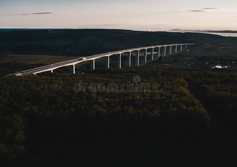 Aerial Shot of a Steel Arch Bridge Built in a Forest Stock Image ...