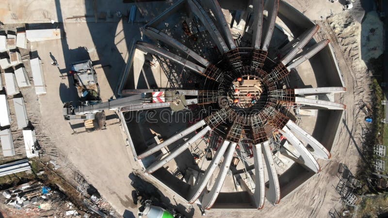 Aerial Shot of Workers in a Construction, Structure in the Process To ...