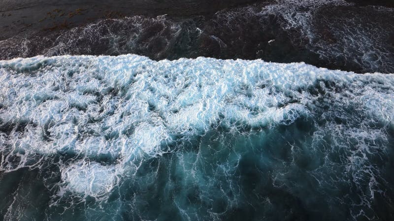 Aerial Slow Motion Capture of Powerful Ocean Waves Breaking Against ...