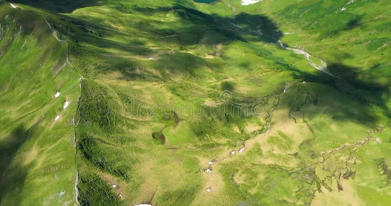Aerial Slow Movement Around Mountain Landscape with Greenery Fields ...