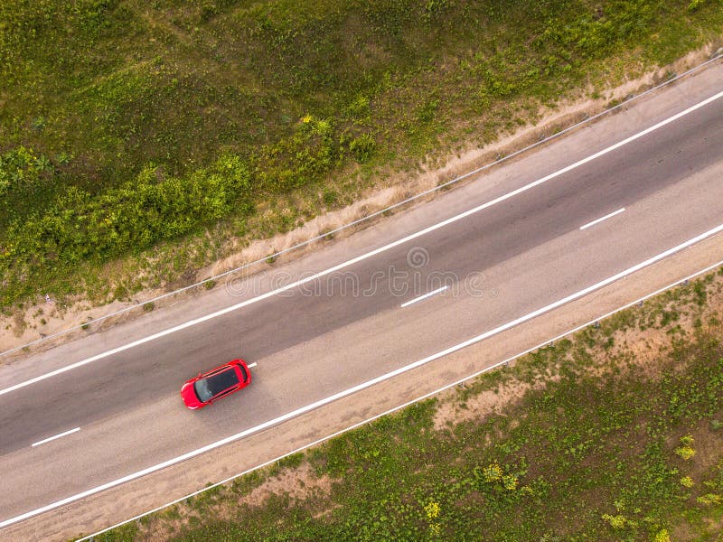 Red car on the highway stock image. Image of countryside - 183058469