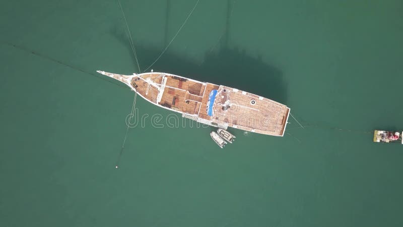 Aerial Top Down Rotating Drone Shot of a Motor Yacht in Caribbean Sea ... Aerial Top Down Rotating Drone Shot of a Motor Yacht in Caribbean Sea ...