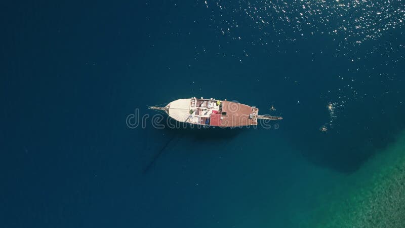 Aerial Top Down Rotating Drone Shot of a Motor Yacht in Mediterranean ... Aerial Top Down Rotating Drone Shot of a Motor Yacht in Mediterranean ...
