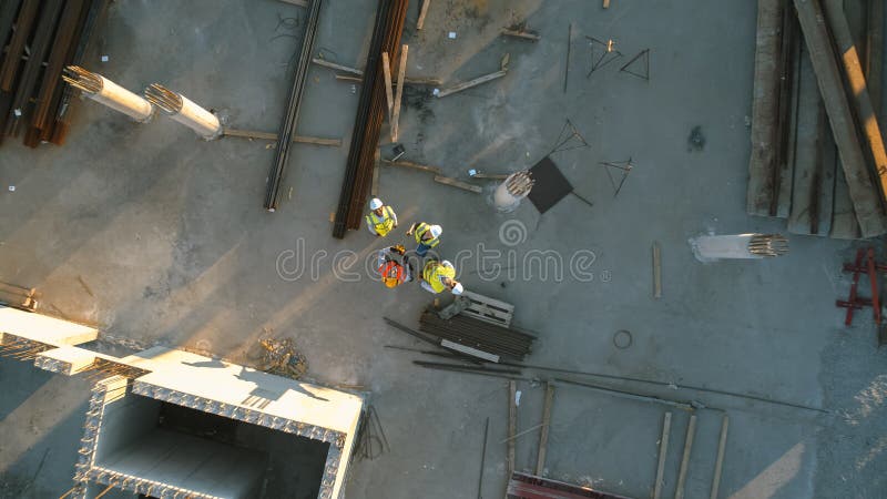 Aerial Top Down Shot of a Constructions Site with Diverse Team of ...