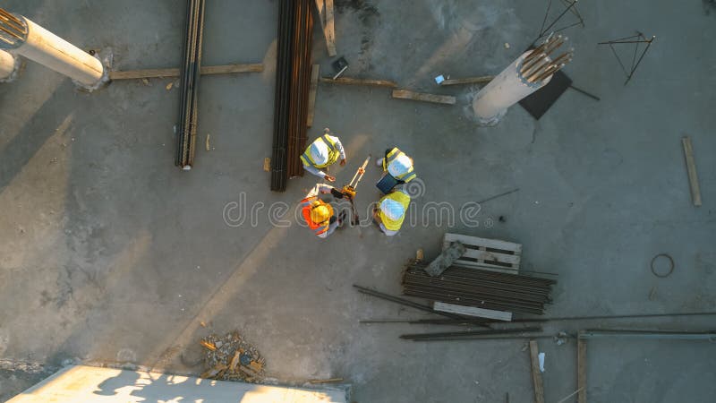 Aerial Top Down Shot of a Constructions Site with Diverse Team of ...