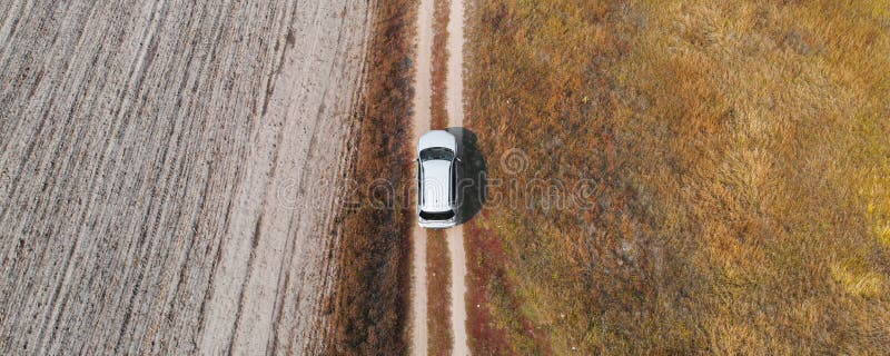 Aerial Top Down View Car Driving Down Rough Terrain Stock Photo - Image ...