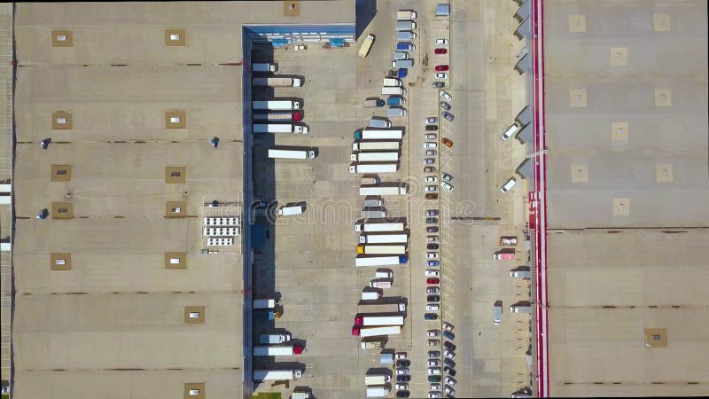 Aerial Top Down View of Cargo Trucks and Containers at Distribution ...