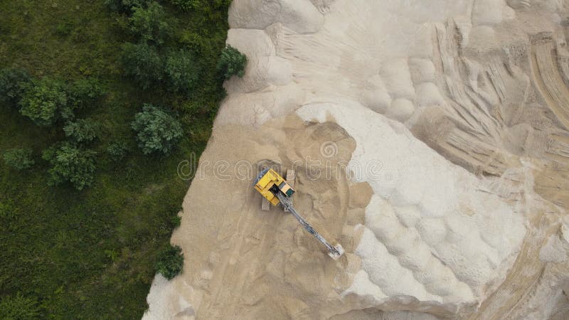 Aerial Top Down View on Excavator is Working in a Sand Quarry Stock ...