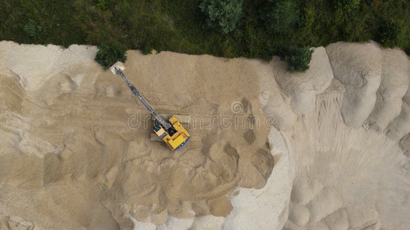 Aerial Top Down View on Excavator is Working in a Sand Quarry Stock ...