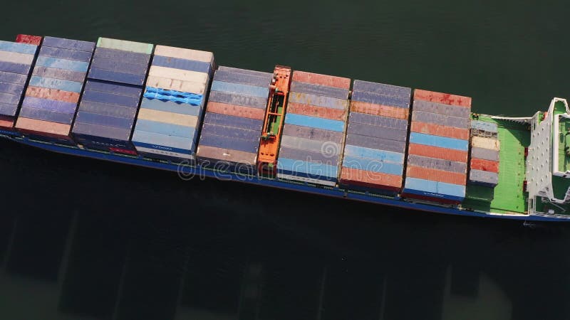 Aerial Top-down View of a Passing Container Ship with a Cargo of ...