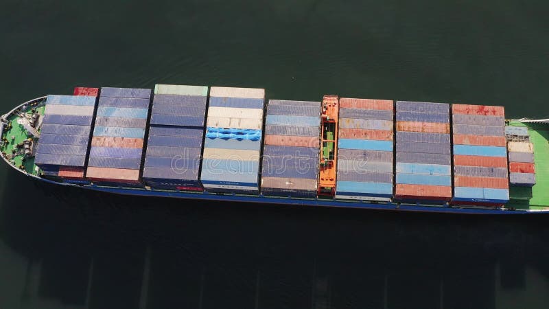 Aerial Top-down View of a Passing Container Ship with a Cargo of ...