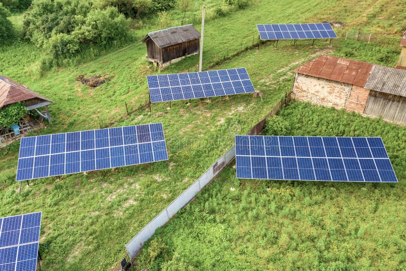 Aerial Top Down View of Solar Panels in Green Rural Area Stock Photo ...