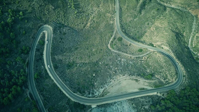 Aerial Top Down View of a Windy Car Road in Mountains Stock Photo ...