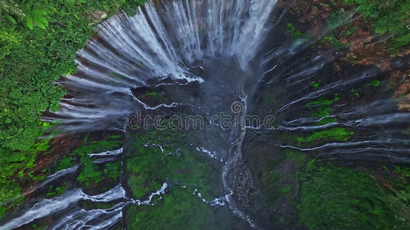 Aerial Top View Drone Rise Up and Spin from Bottom of Tumpak Sewu ...