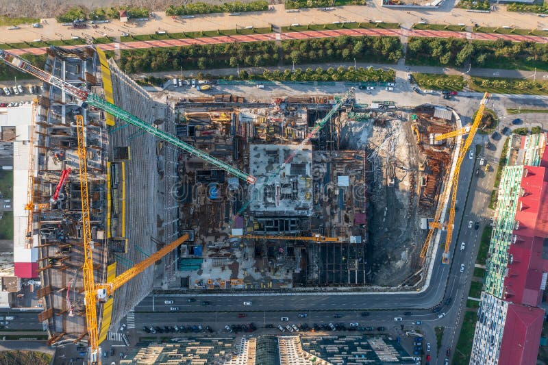 Aerial Top View of Large Construction Site with Multiple Cranes and ...