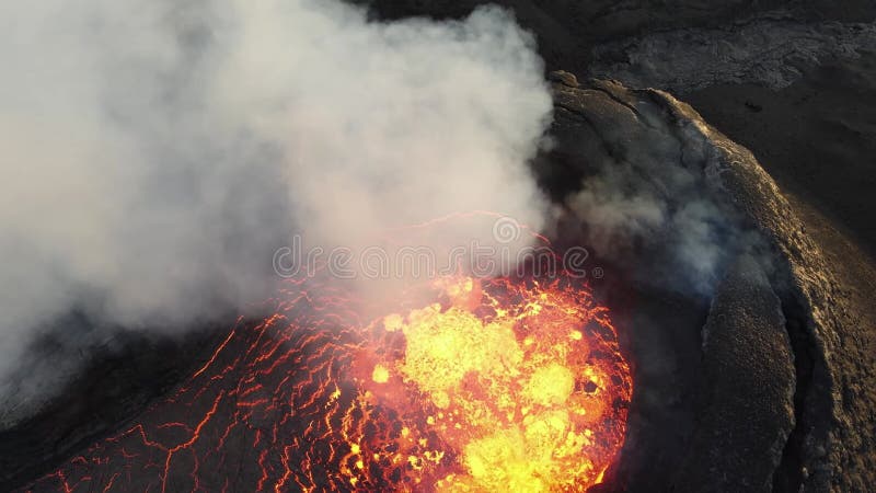 Aerial Top View of Lava Erupting from a Volcano at Sunset Stock Footage ...