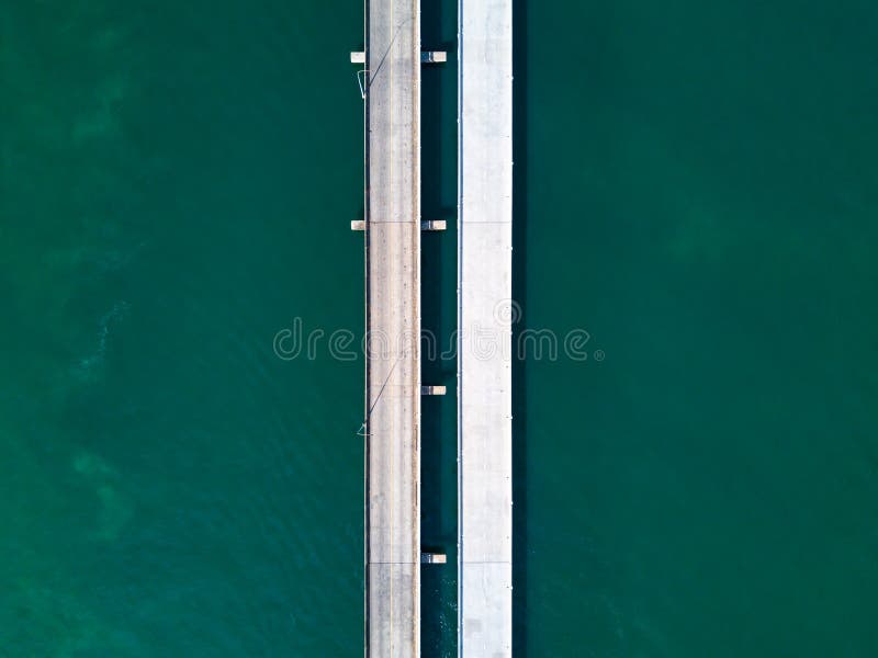 Aerial Top View of a Long Highway Bridge Above a Ocean. Stock Photo ...