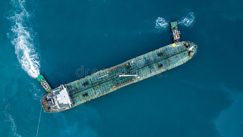 Aerial Top View Oil Tanker Ship at Terminal Industrial Port Tugboat ... Aerial Top View Oil Tanker Ship at Terminal Industrial Port Tugboat ...