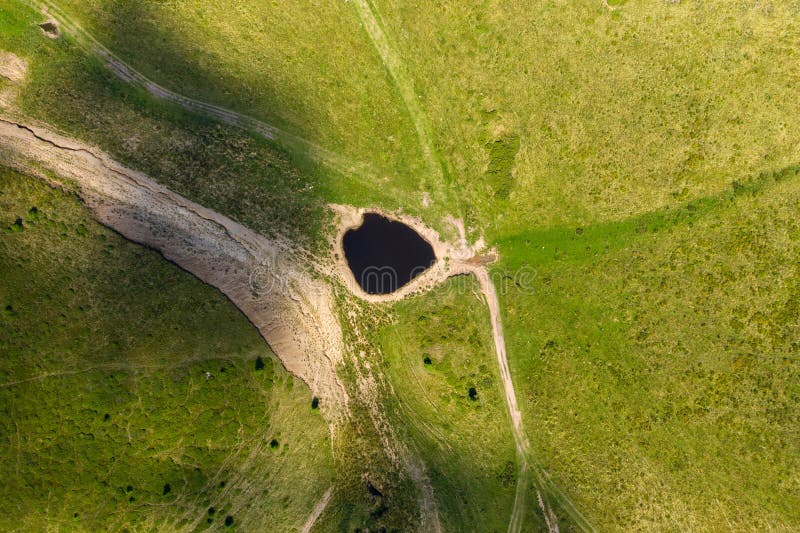 Aerial top view of a pond stock photo. Image of environment - 155737772