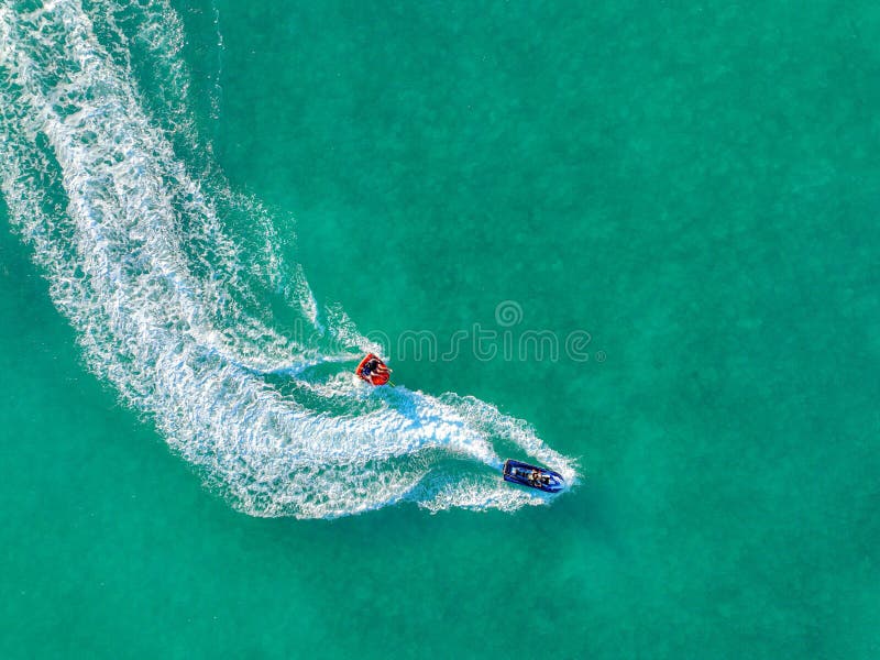 Aerial Top View of a Speed Boat Navigating the Open Ocean Performing ...